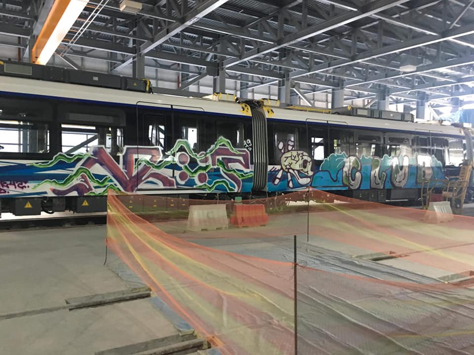 Vandals spray graffiti and slogans on brand new wagons of Thessaloniki ...
